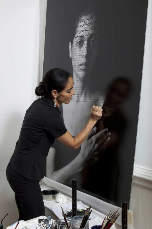 Shirin Neshat: Investigating Cultural Identity Through Powerful Imagery