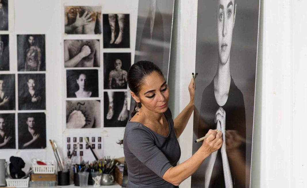 Shirin Neshat: Investigating Cultural Identity Through Powerful Imagery